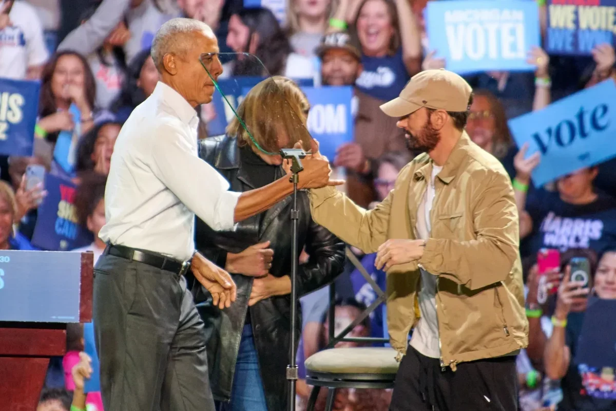 Barack Obama sobe em palco e canta versos de rap ao lado de Eminem